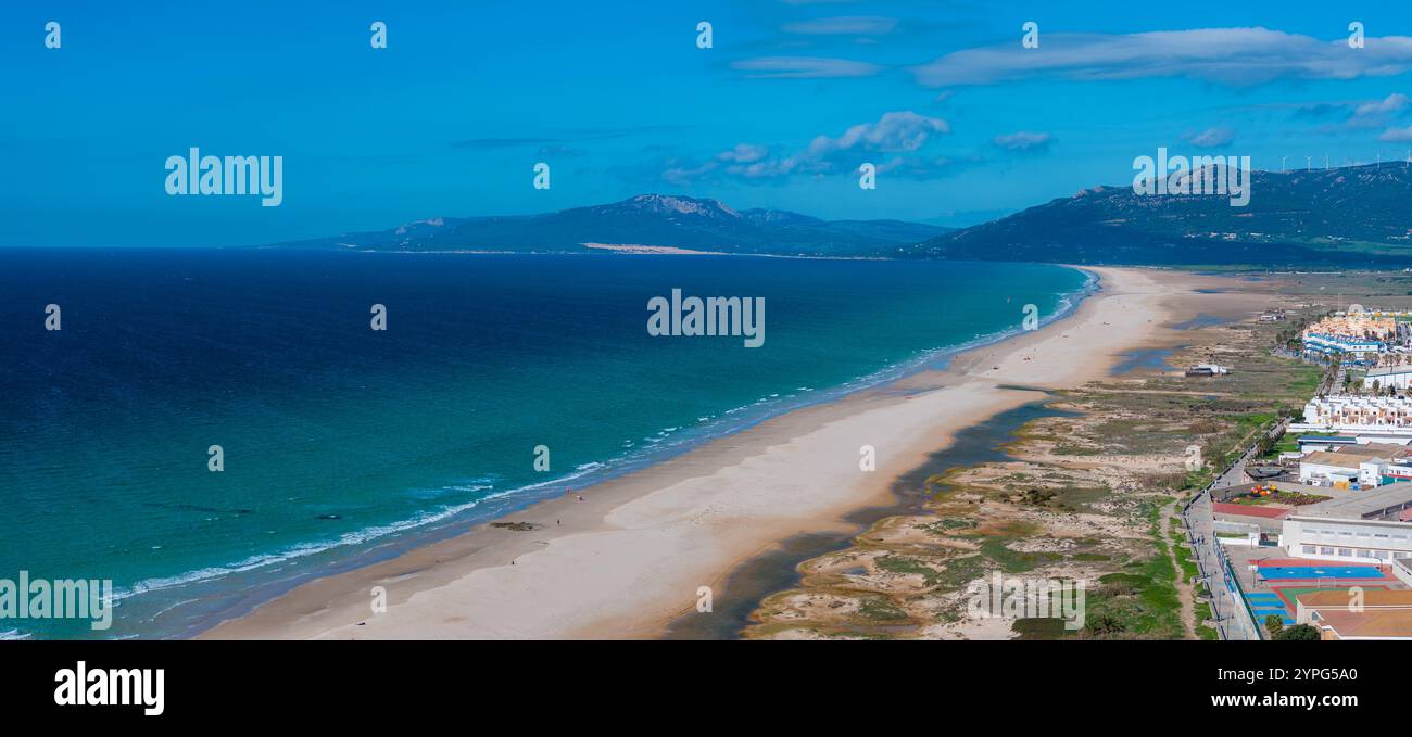 Tarifa, Spain, features a beach along the Atlantic Ocean with kite ...