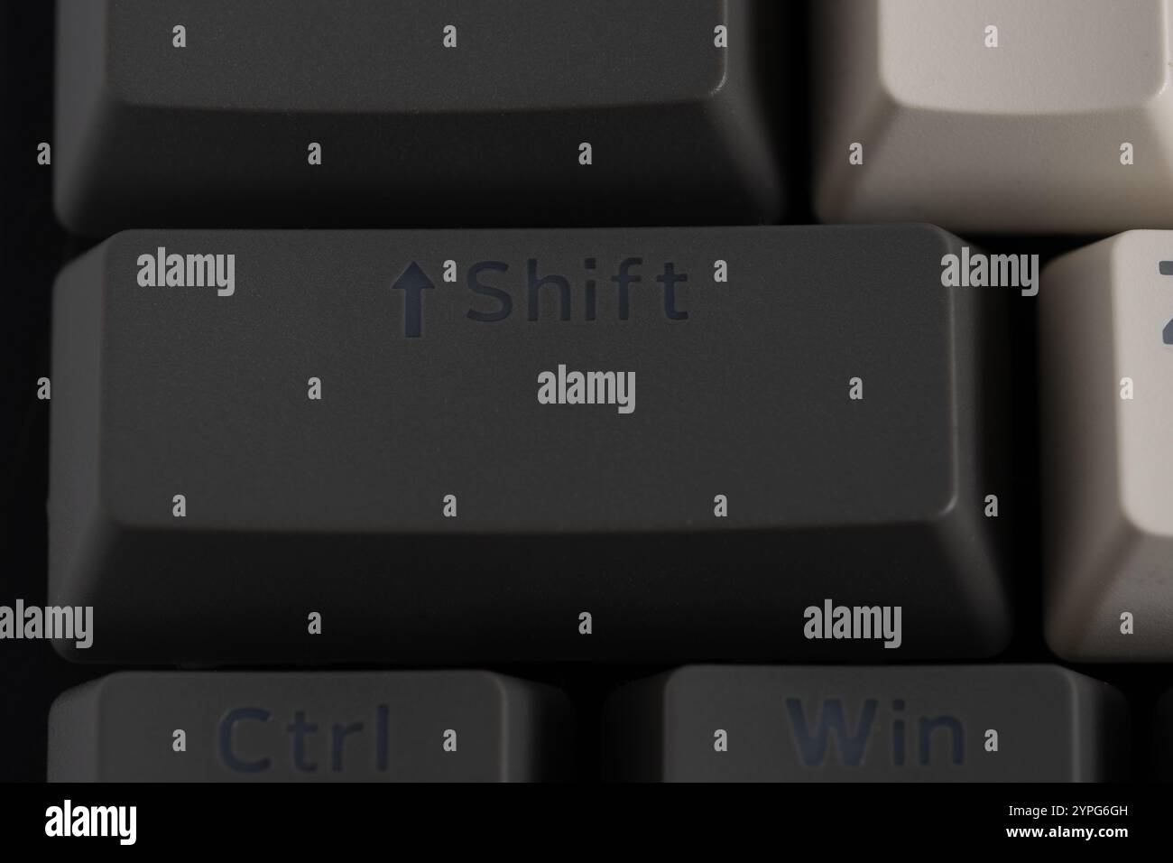 Shift key on keyboard, closeup of gray color Stock Photo - Alamy