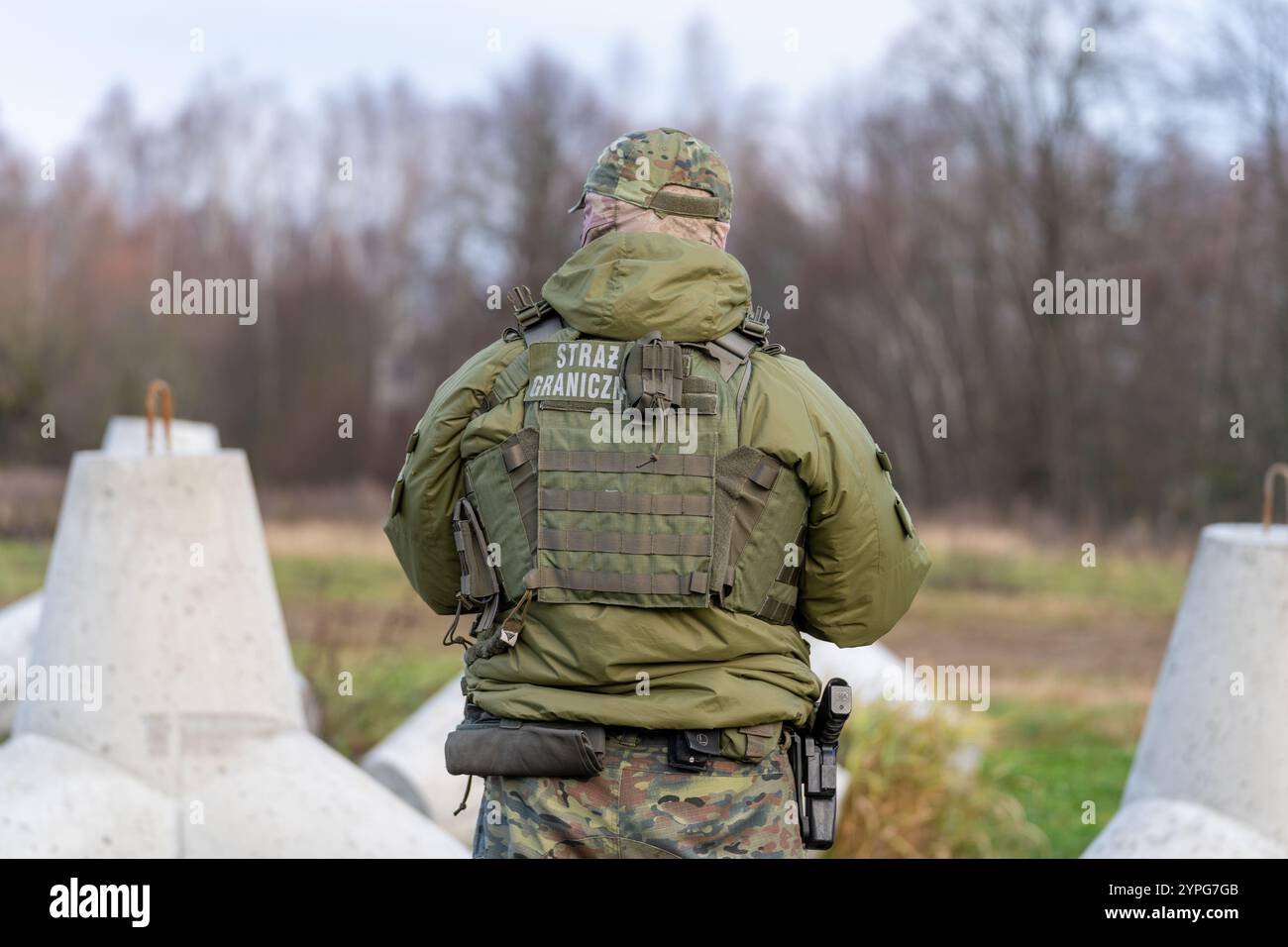 A border guard patrols the Polish-Russian border. Polish Prime Minister ...