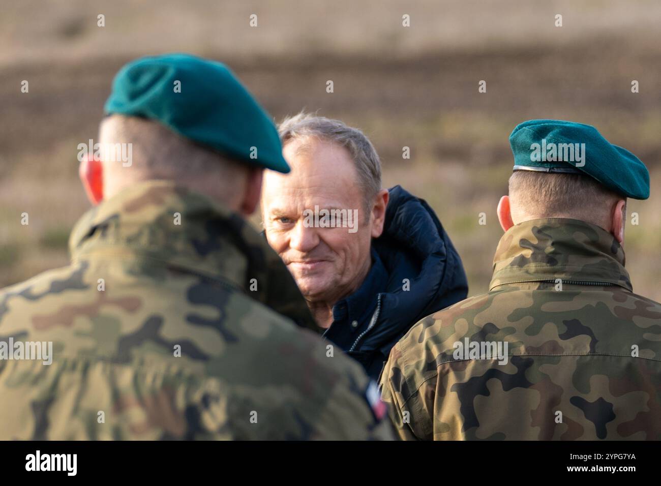 Polish Prime Minister Donald Tusk talks with soldiers. Polish Prime Minister Donald Tusk visited ...