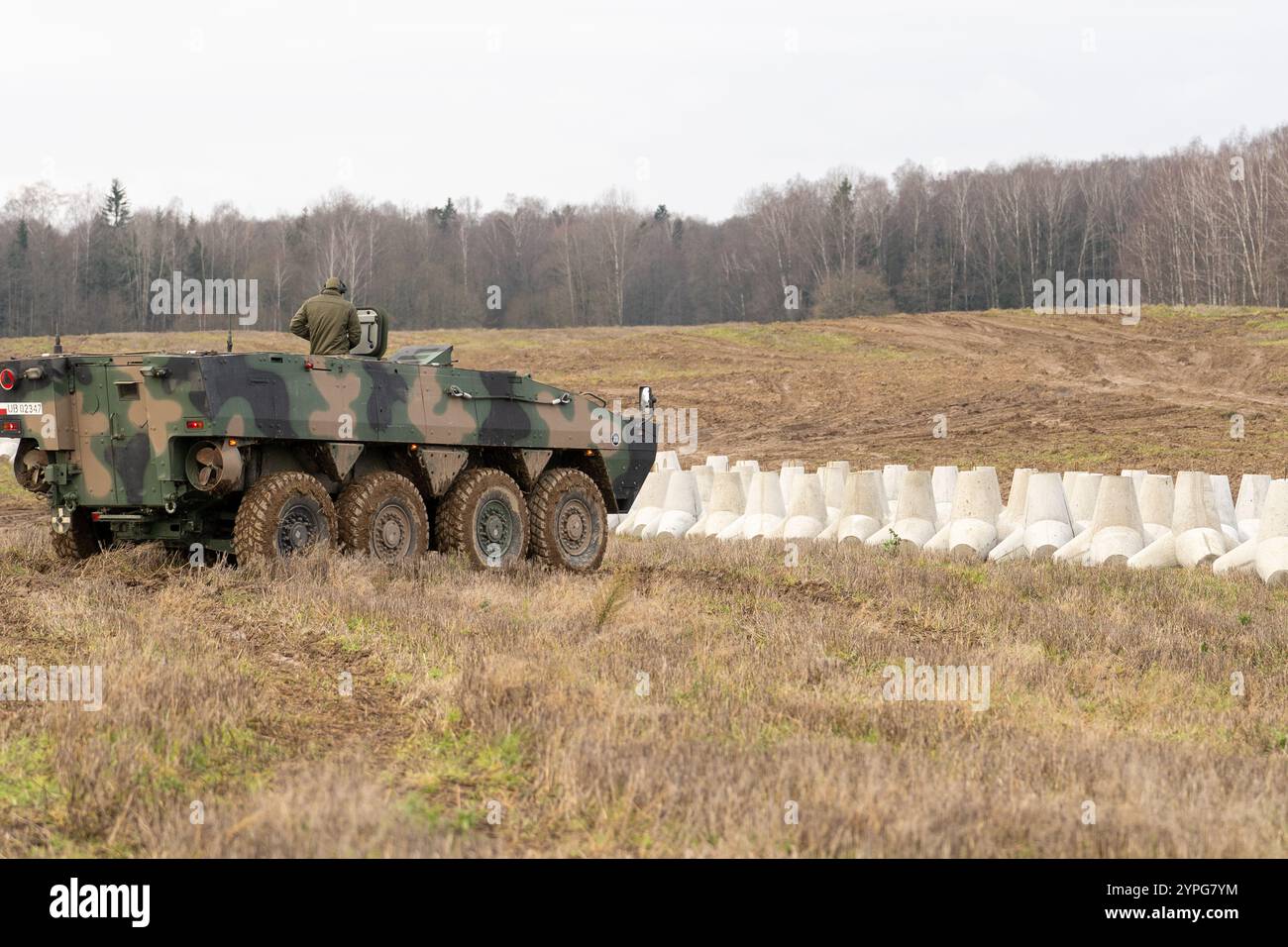 KTO Rosomak next to the Concrete barriers that are part of Poland's ...