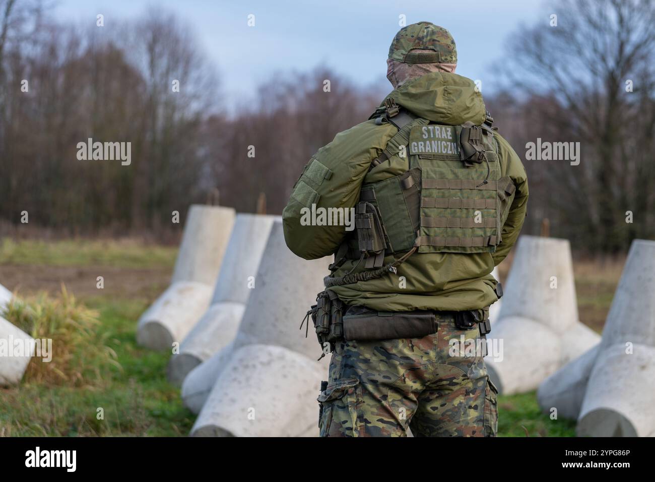 A border guard patrols the Polish-Russian border. Polish Prime Minister ...