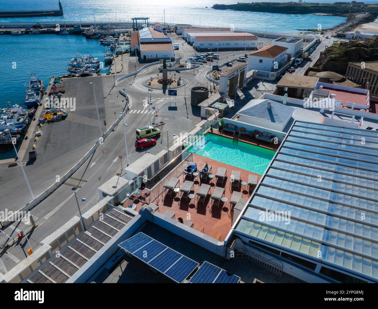 Aerial View of Tarifa's Coastal Scene with Harbor and Pool Stock Photo ...