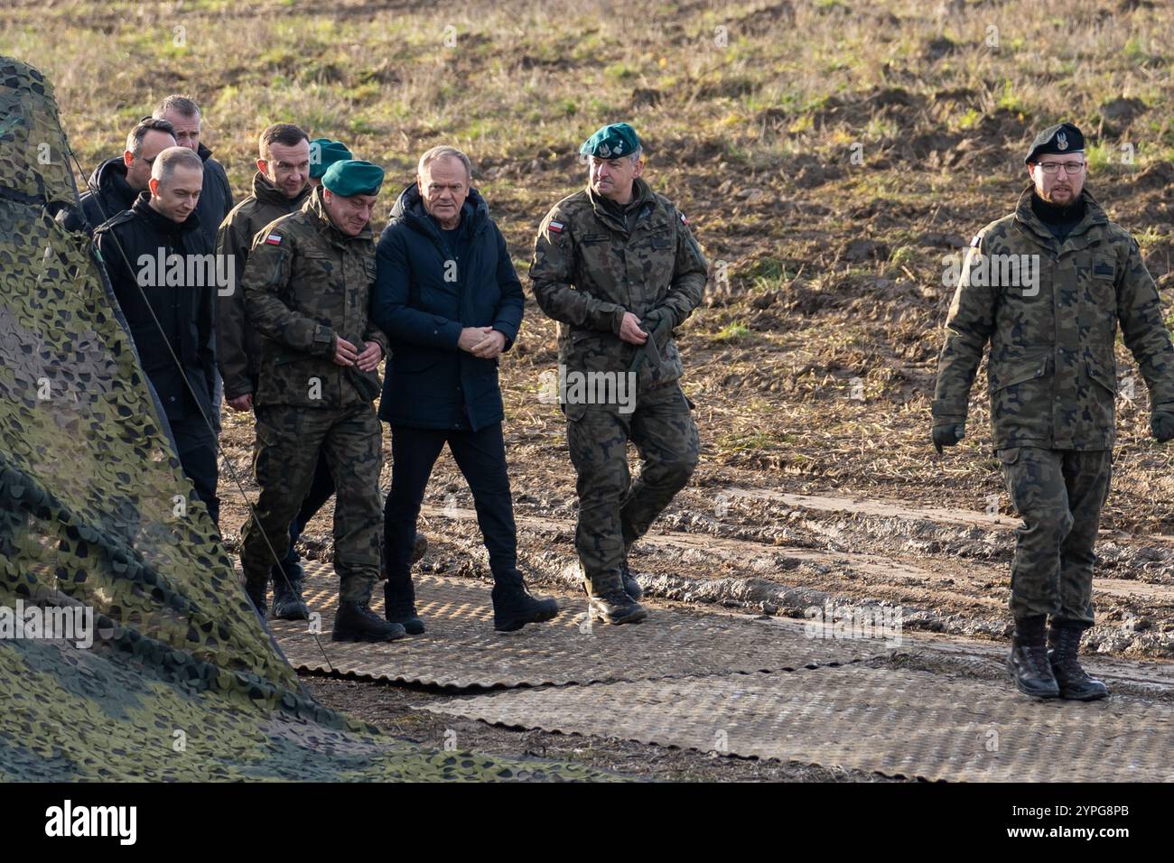 Polish Prime Minister Donald Tusk talks with soldiers. Polish Prime ...