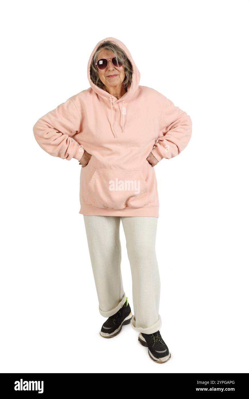 An old lady in sunglasses and a hood on her head isolated on a white ...