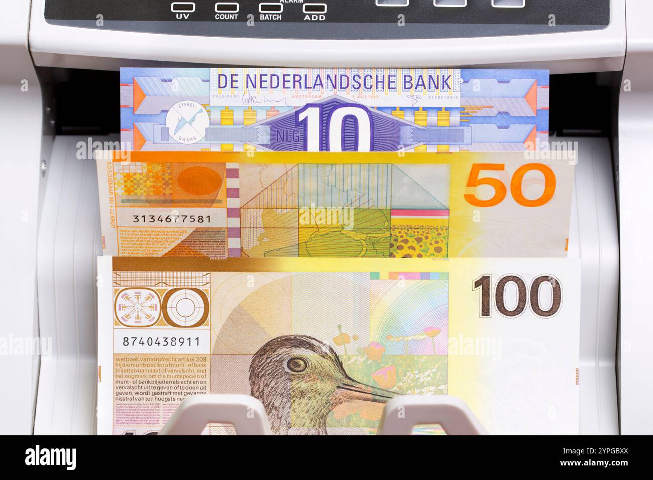 Dutch money - guilder in the counting machine Stock Photo - Alamy