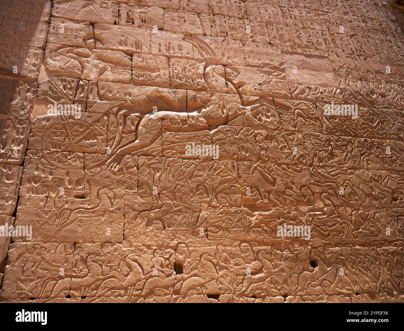 Bas-relief and hieroglyphs in the Mortuary Temple of Ramesses III ...