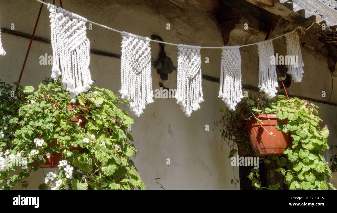 Decorative braids hanging on a clothesline Stock Photo - Alamy