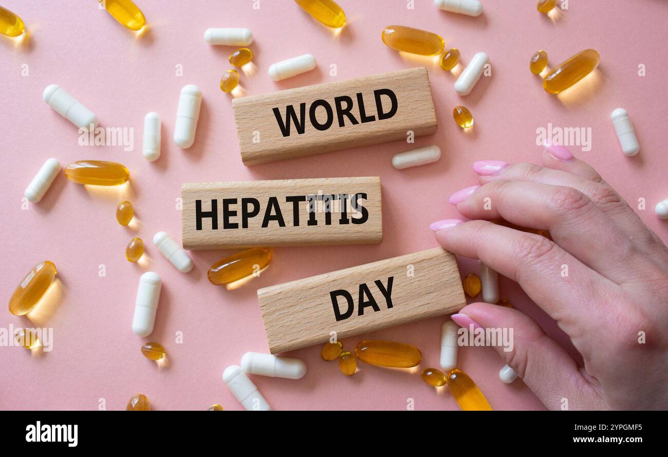World Hepatitis Day symbol. Concept words World Hepatitis Day on wooden ...