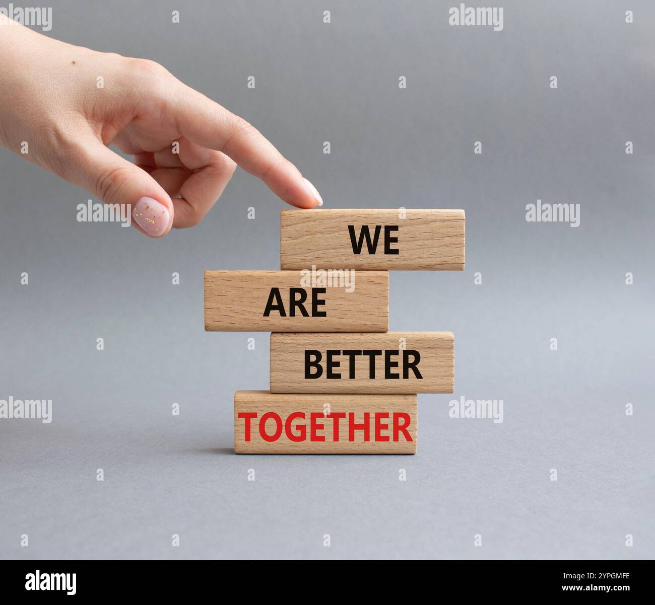 We are better together symbol. Wooden blocks with words We are better ...