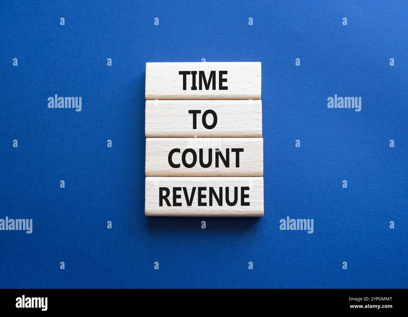 Time to count Revenue symbol. Wooden blocks with words Time to count ...
