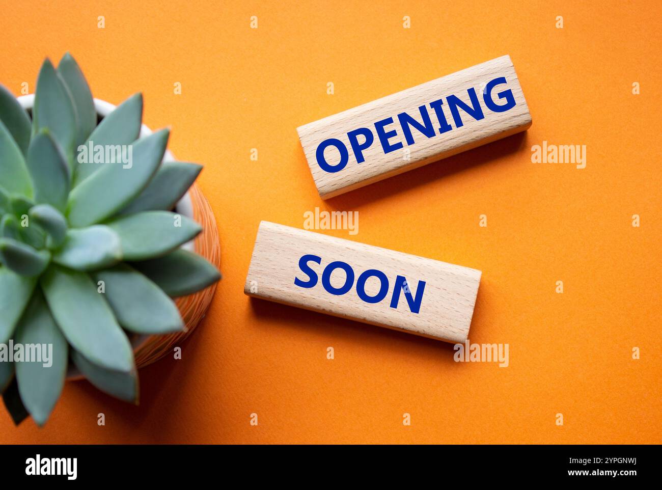 Opening soon symbol. Concept word Opening soon on wooden blocks ...
