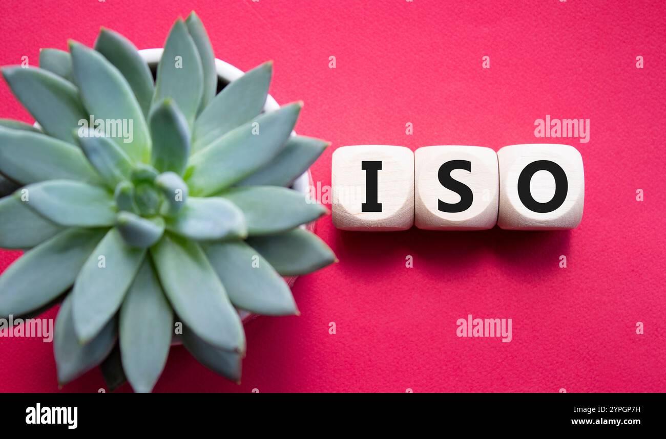 ISO standards quality control symbol. Concept word ISO on wooden cubes ...
