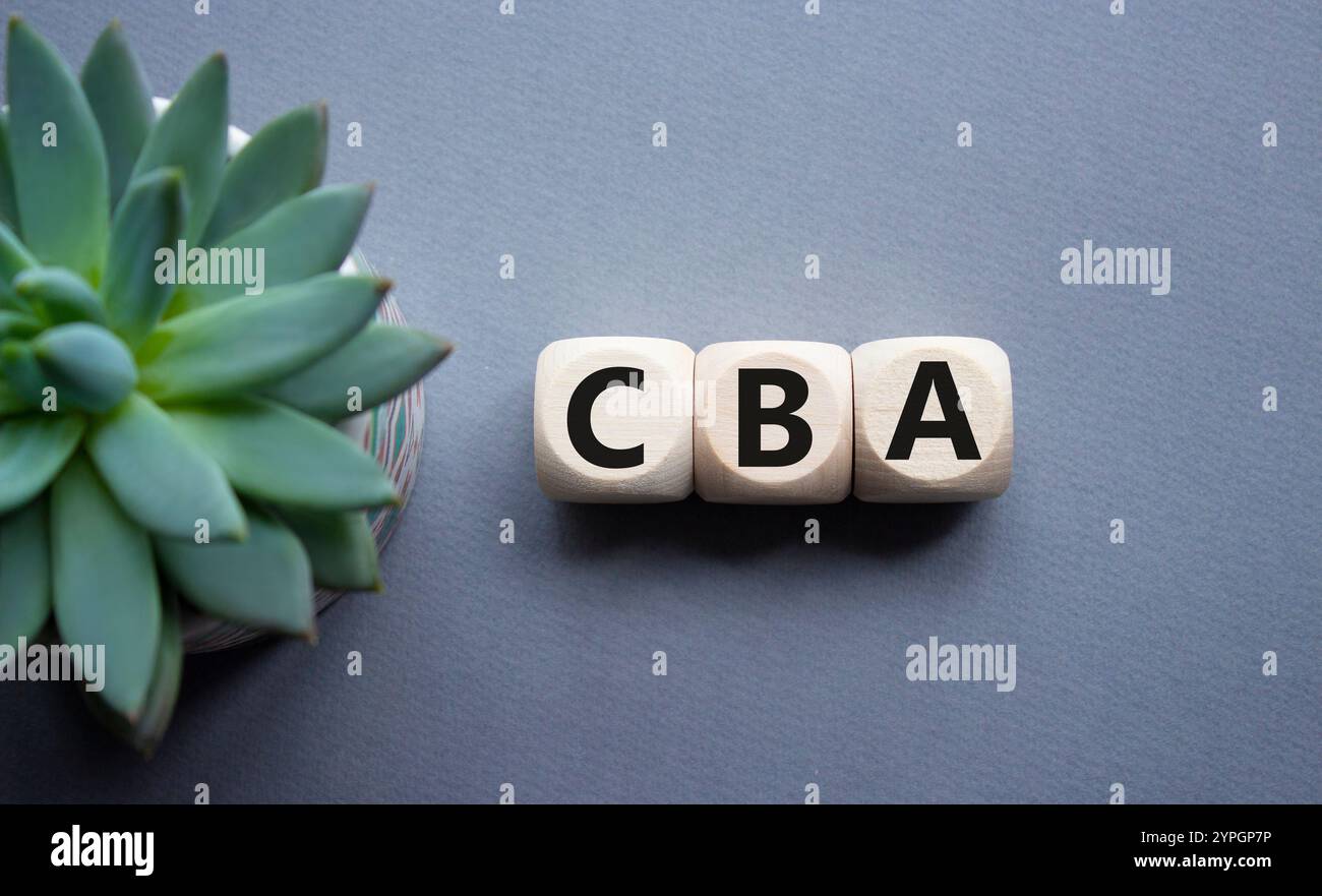 CBA - Cost Benefit Analysis symbol. Wooden cubes with word CBA ...