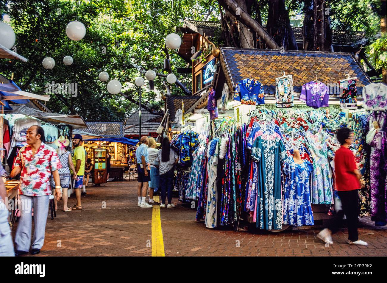 Tourists people looking round the International Market Place in Waikiki ...