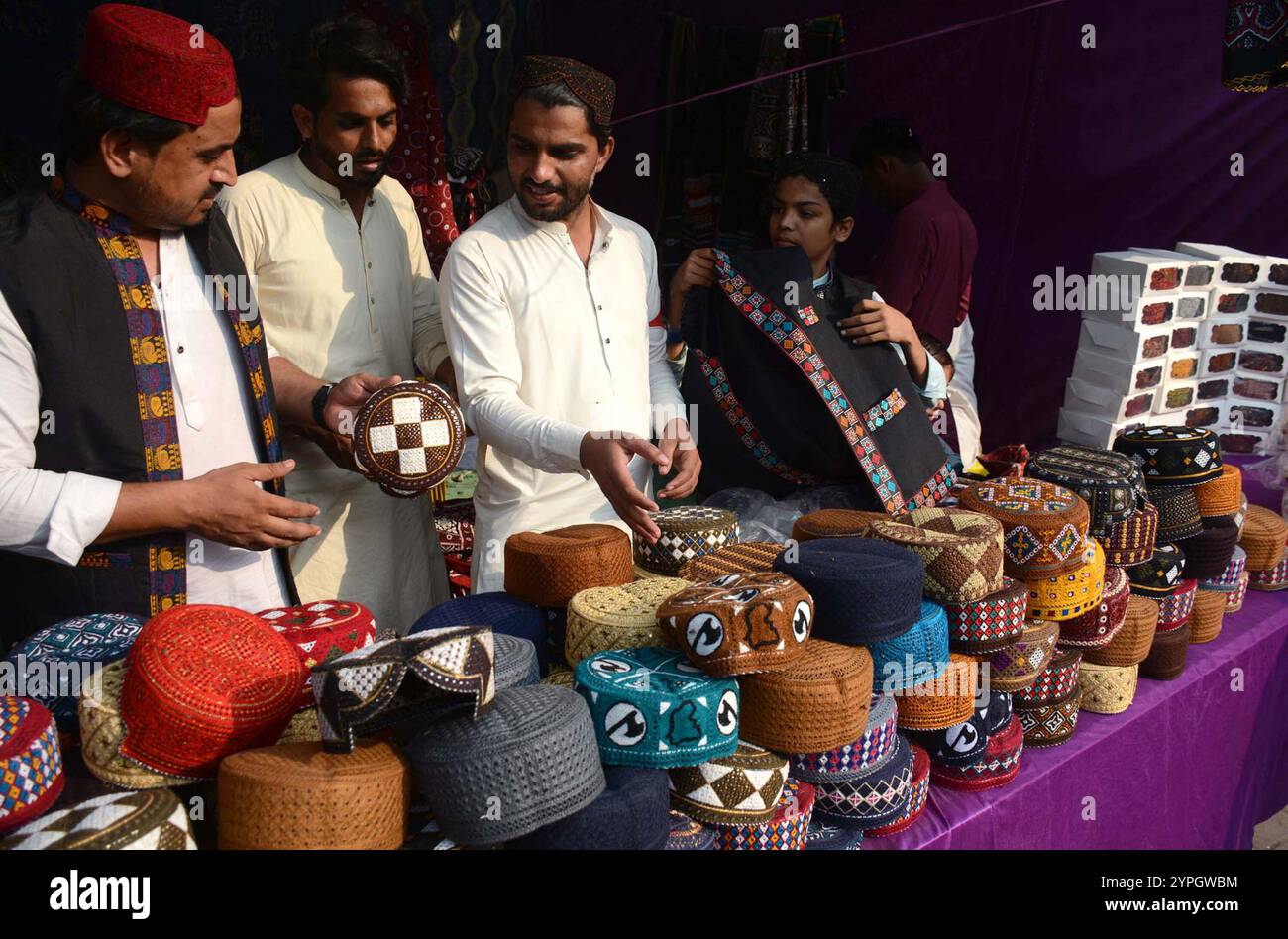 Traditional Sindhi Caps are being selling at a roadside stall in connection of Sindh Cultural ...