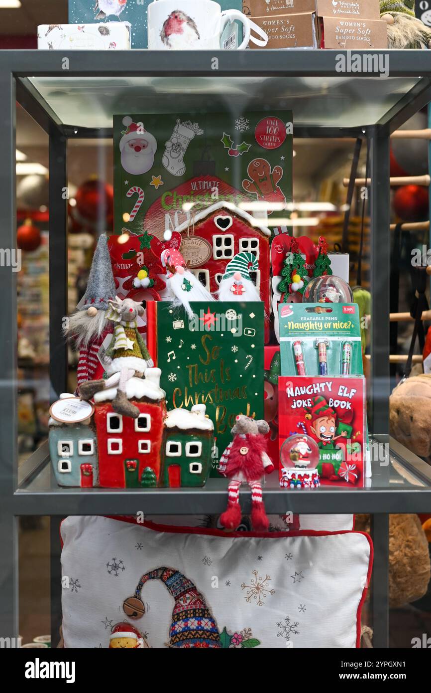 Christmas Gifts on display in a shop window Stock Photo - Alamy