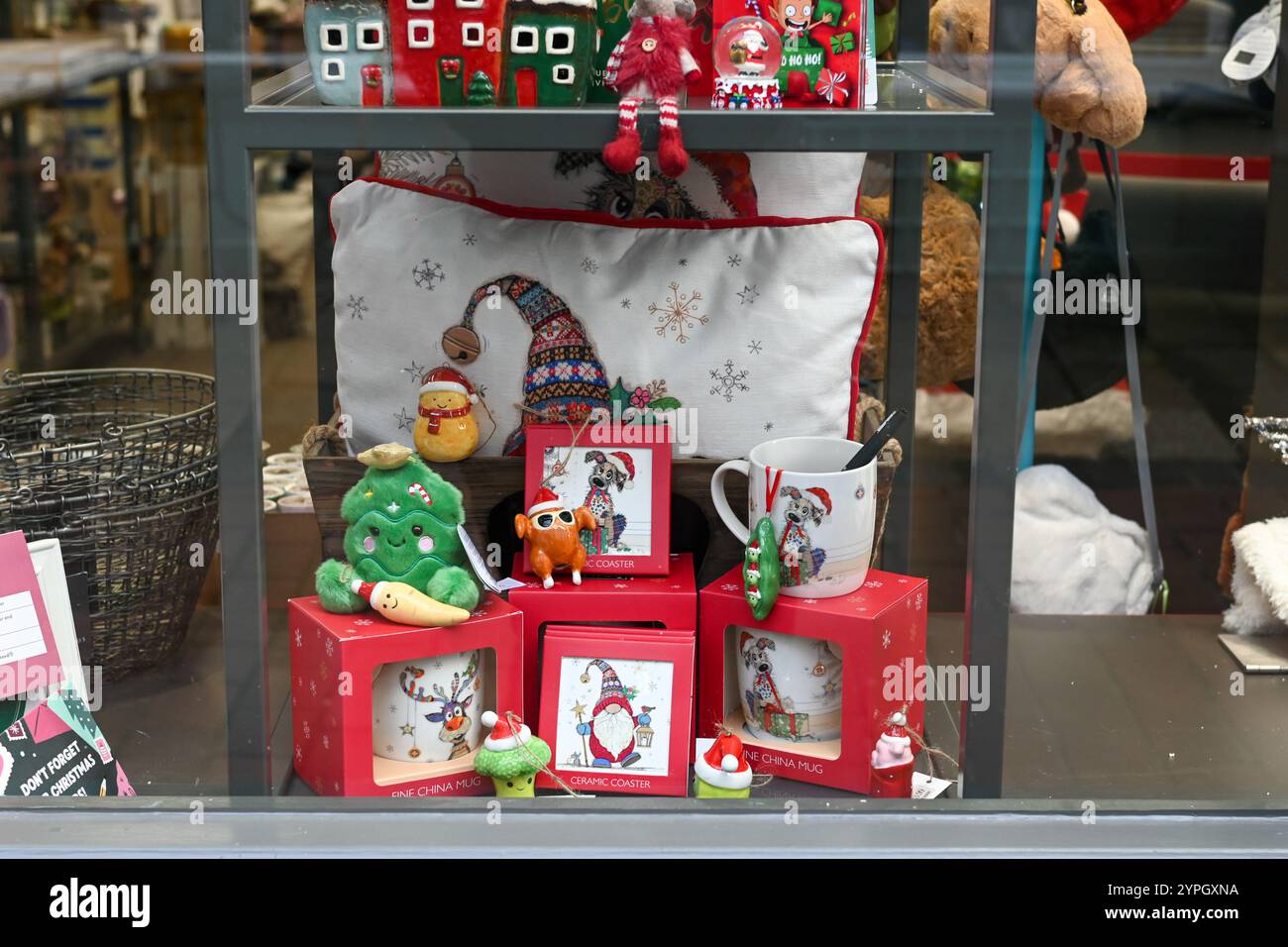 Christmas Gifts on display in a shop window Stock Photo - Alamy