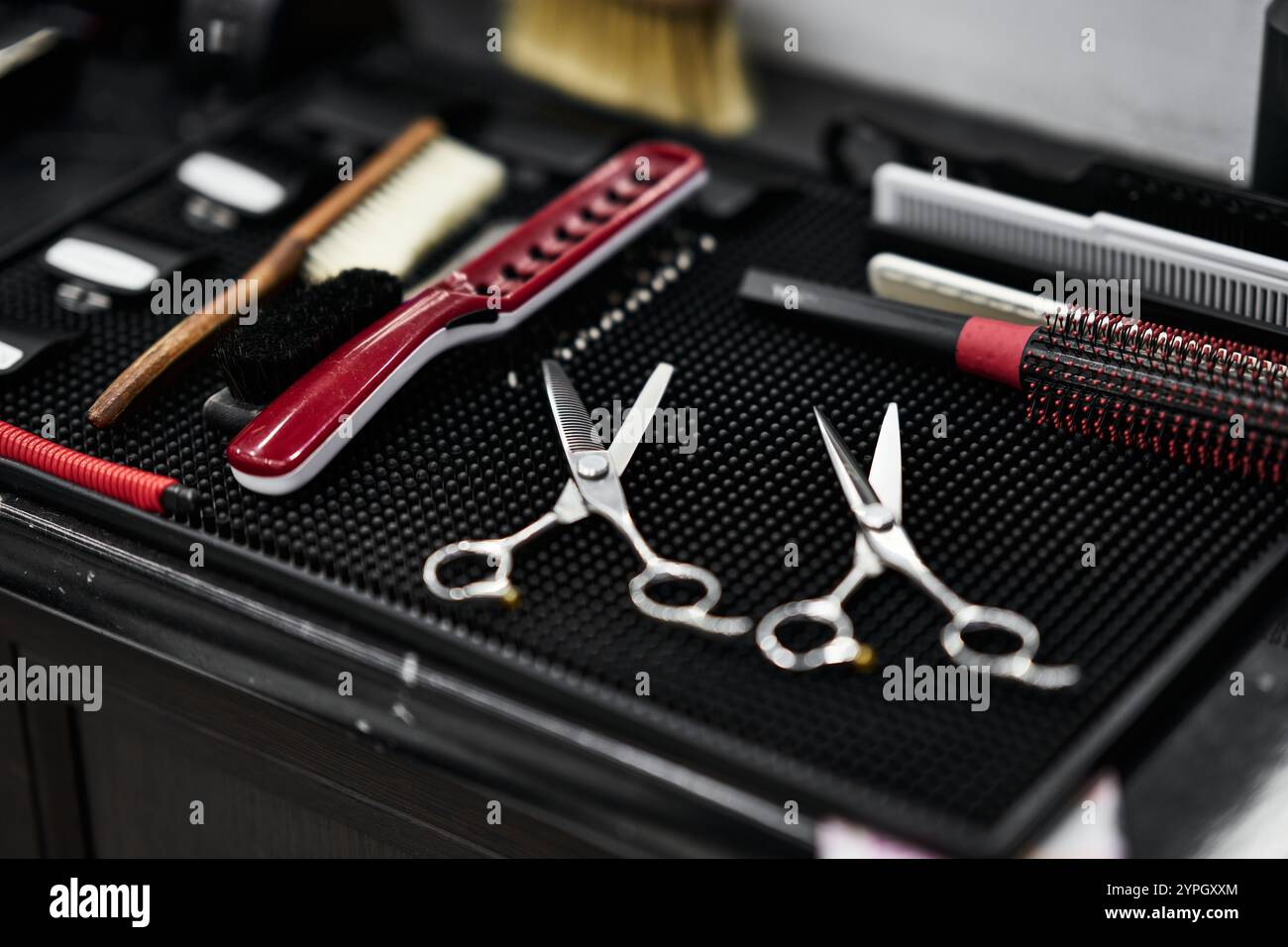 Tools for grooming prepared on a work surface in a barbershop setting ...
