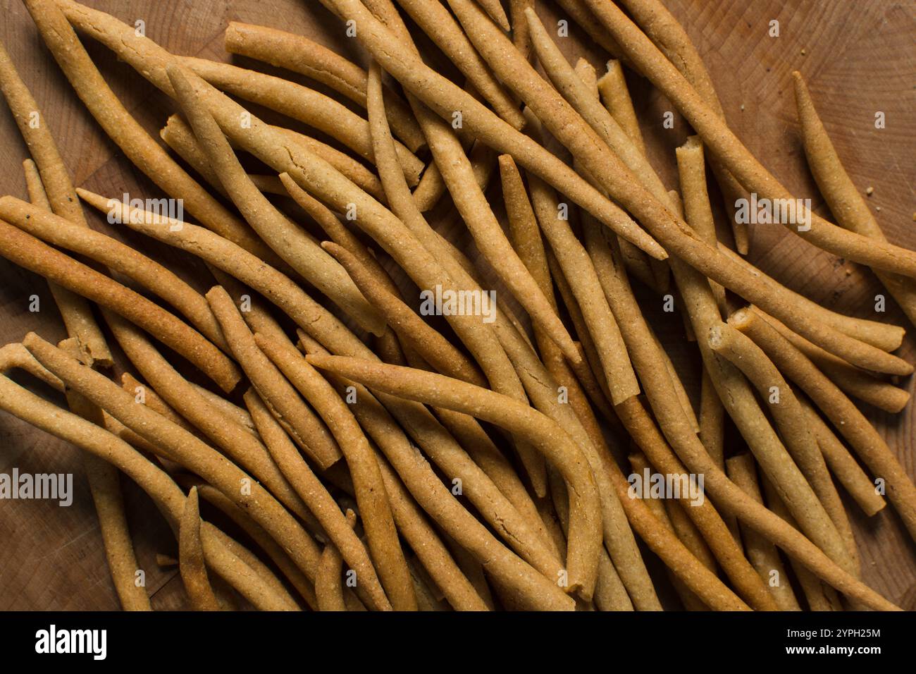 Top view of fried corn stick snack on a wood board, Overhead view of ...