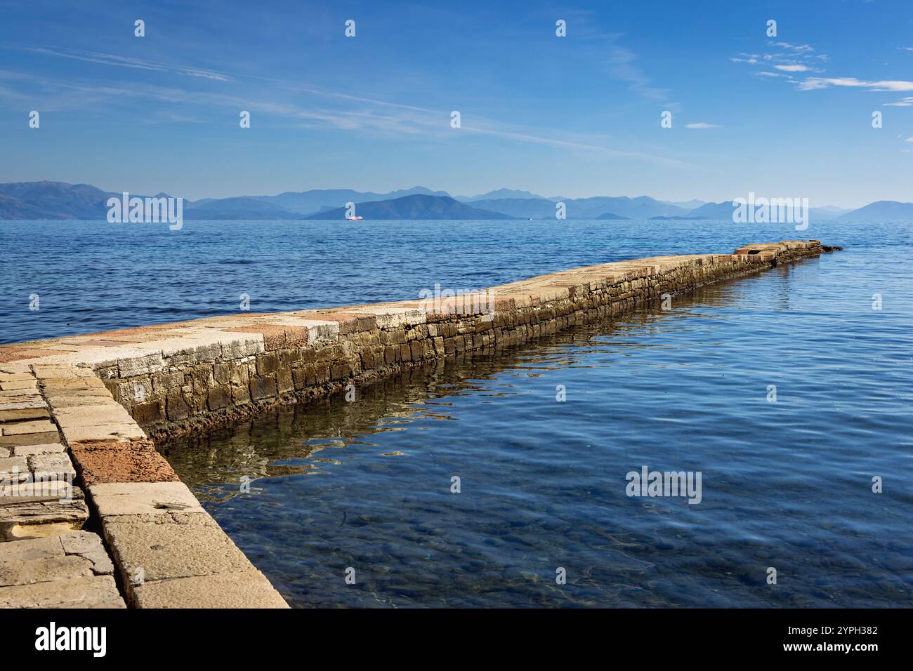 Stone pier at Kardaki Beach inside the Mon Repos estate, on the Kanoni ...