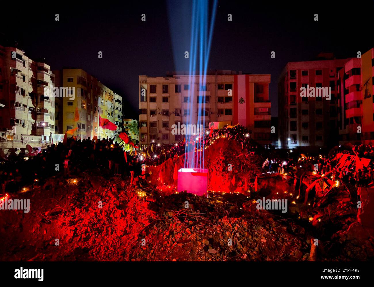 People gather at the site where former Hezbollah leader Sayyed Hassan ...