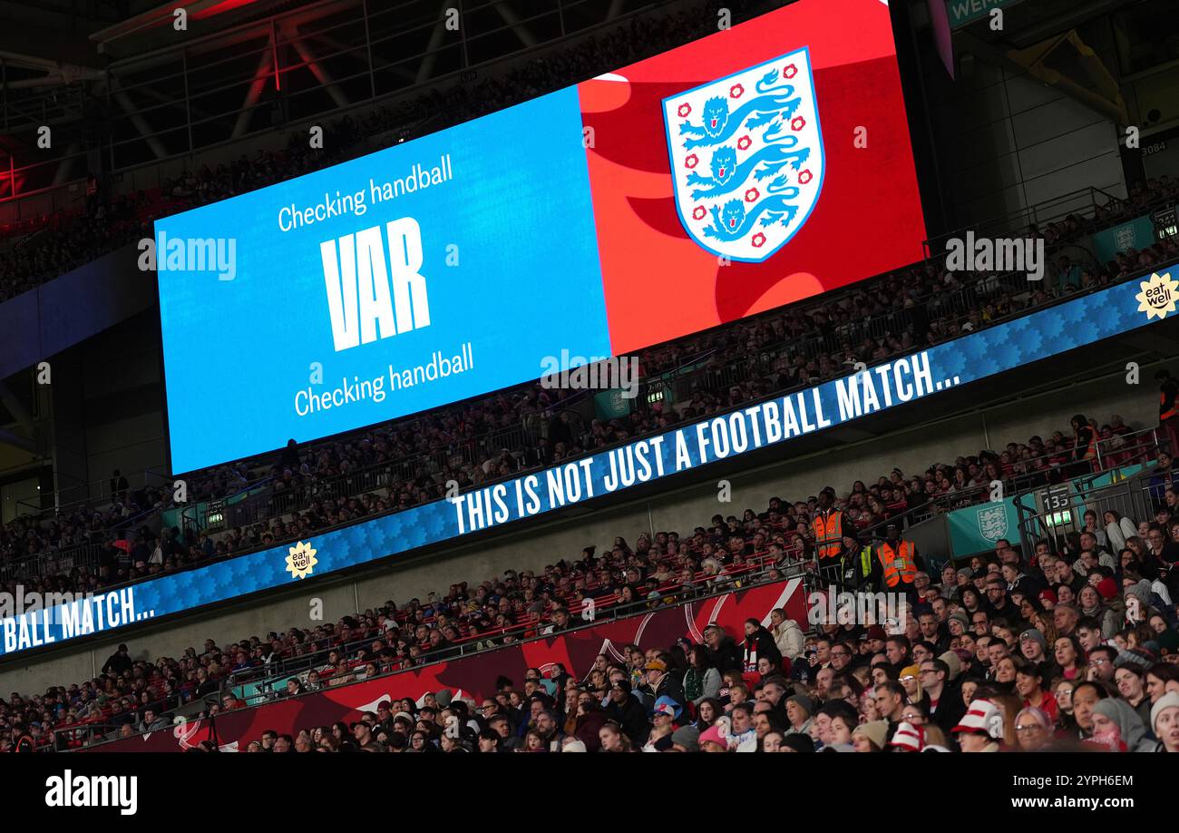 The big screen displays a VAR check for a handball against England's ...