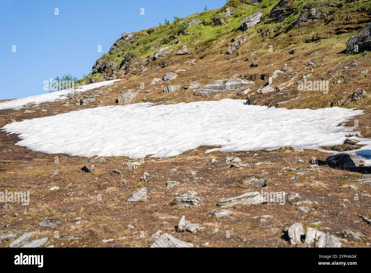 Patch of snow in summer at Mount Storsteinen in Tromso, Norway Stock ...