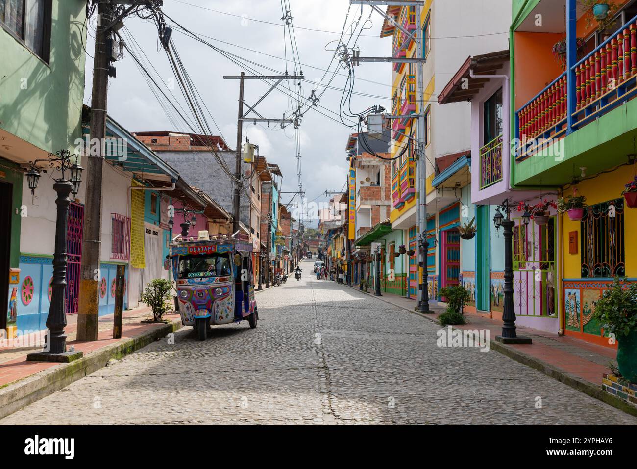 The image shows a colorful street in Guatape, Antioquia, Colombia ...