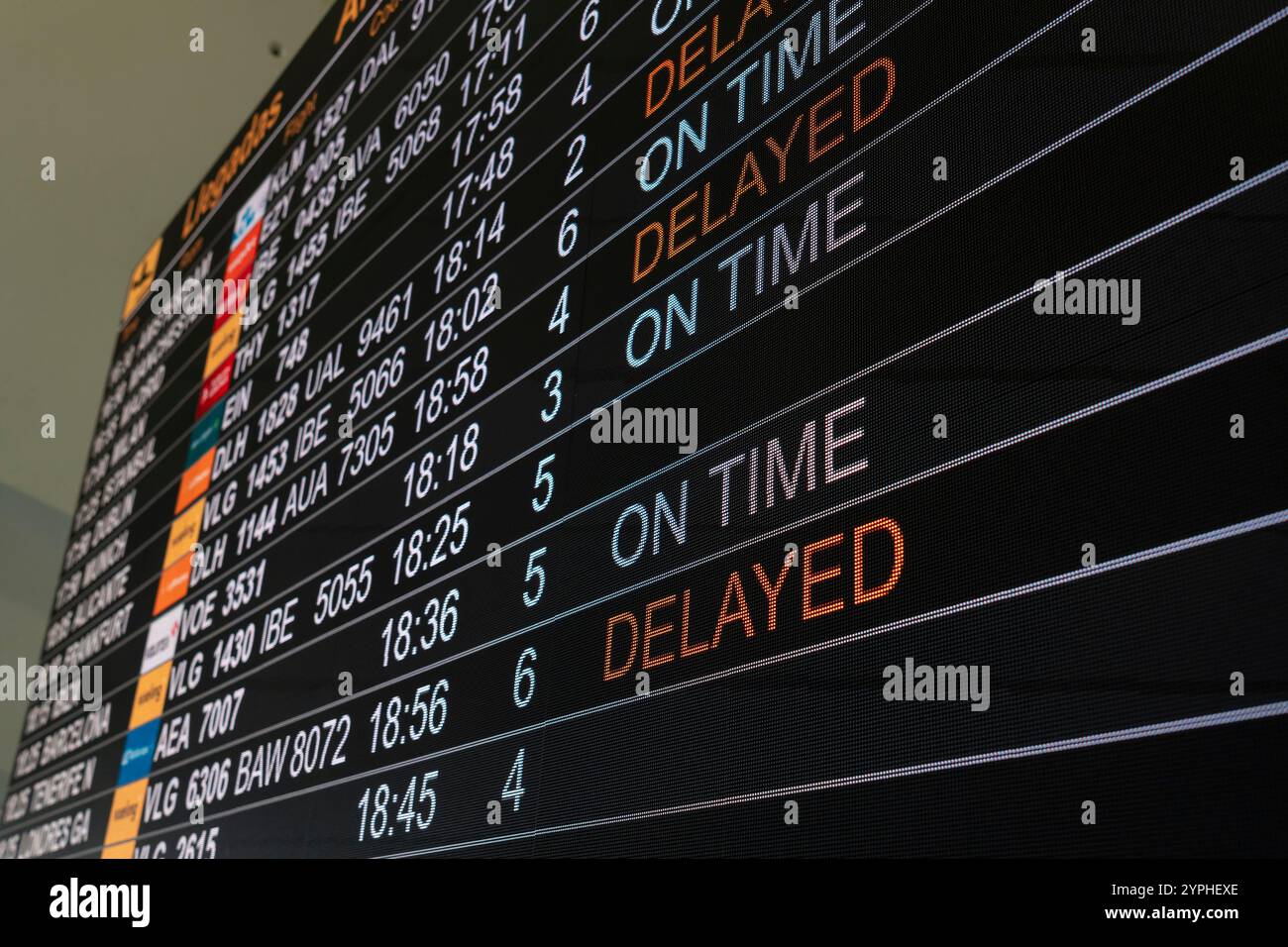 The flight information display lists arriving and departing flights in ...