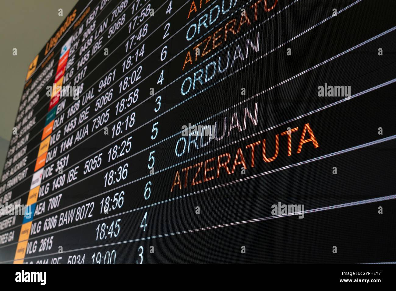 The flight information display lists arriving and departing flights in ...