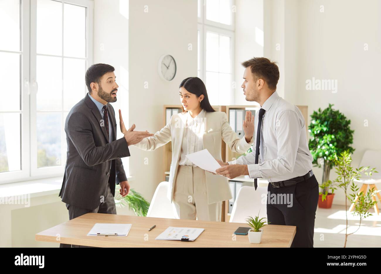 Angry Business Team Arguing And Shouting During Office Meeting Stock ...