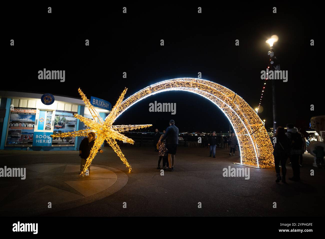 Torquay, UK. 30 November 2024. People visit Torquay's Bay of Lights as ...
