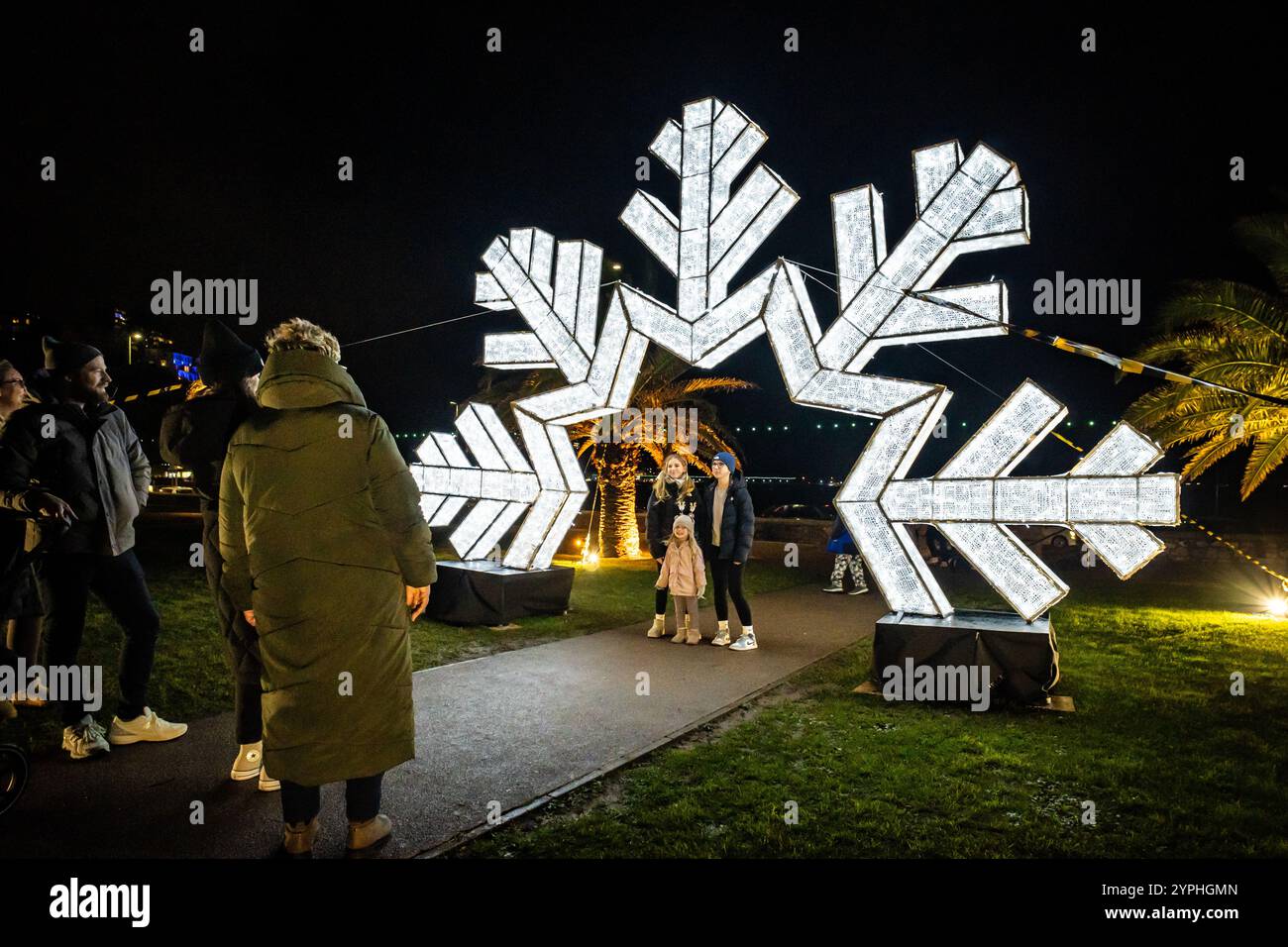 Torquay, UK. 30th Nov, 2024. People visit Torquay's Bay of Lights as ...