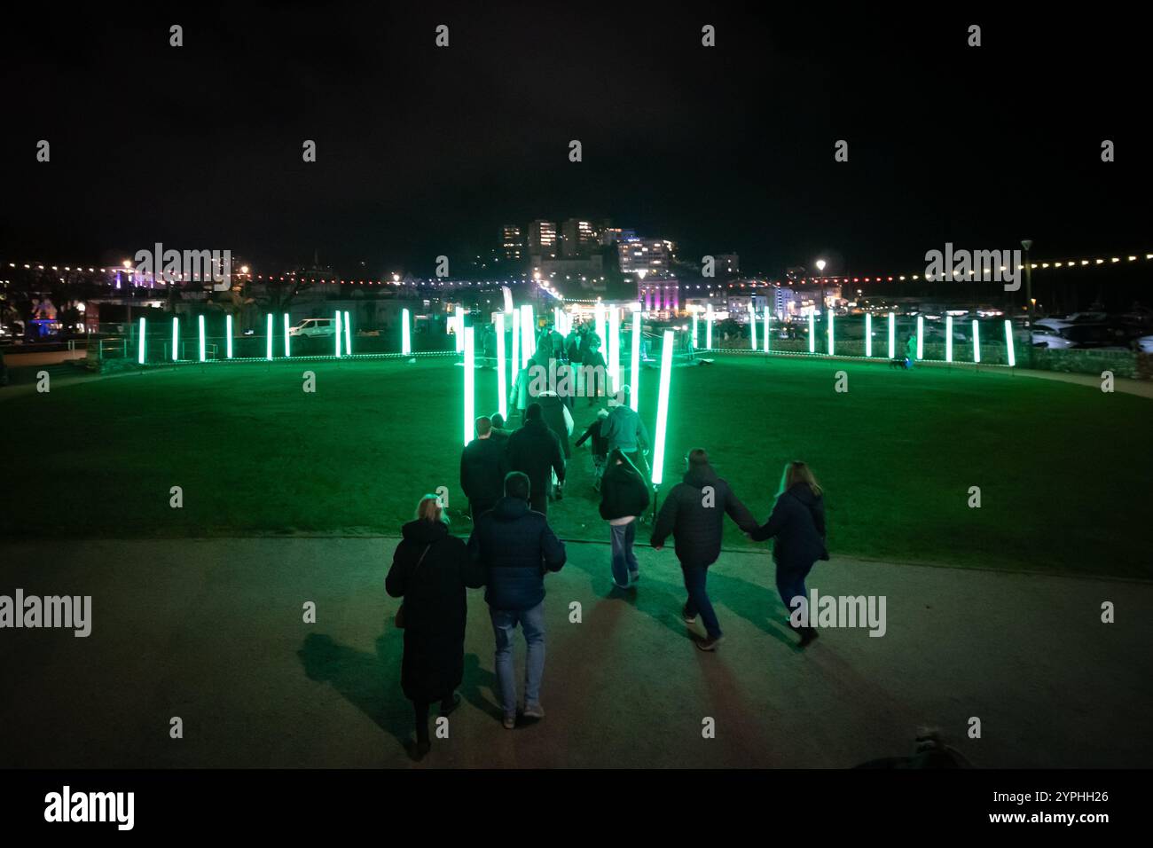 Torquay, UK. 30 November 2024. People visit Torquay's Bay of Lights as ...