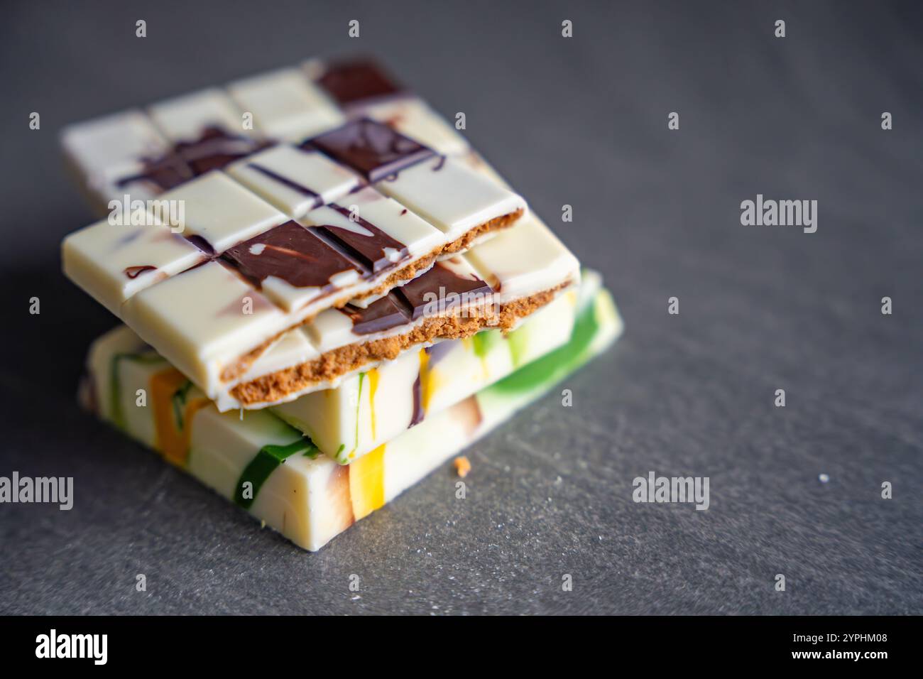 Piece of trend Dubai white chocolate with halva paste. Confectionery ...