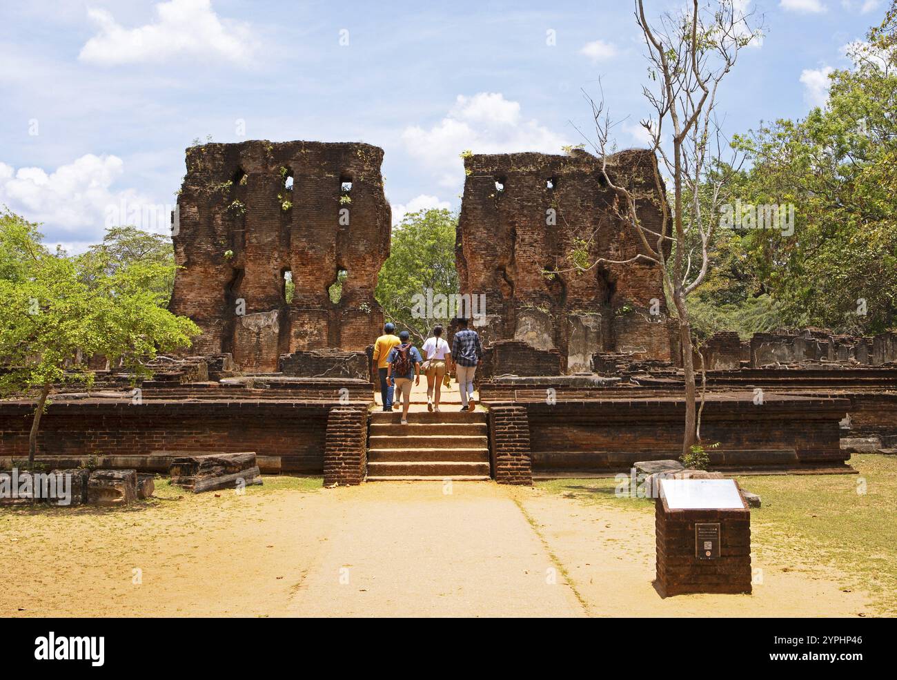 Visitors at the palace of King Parakramabahu in the ruined city of ...