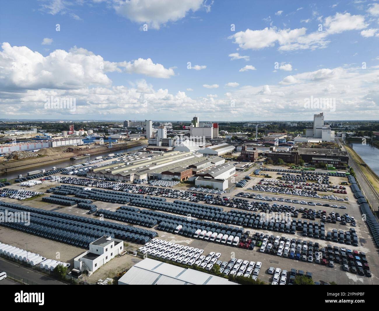 Car terminal in a port on the Rhine. Vehicles are stored, loaded and ...