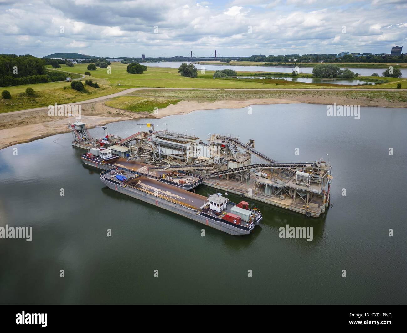 Gravel and sand extraction at the river Rhine using a gravel extractor ...
