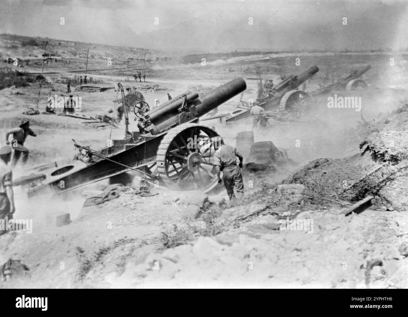 British artillery guns fire towards German positions during World War ...