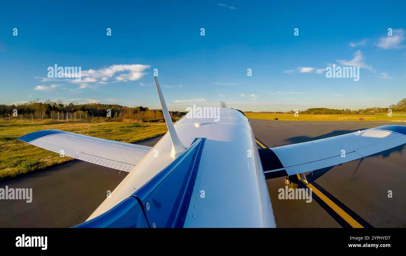 A small general aviation aircraft, its pre-takeoff checklist complete ...