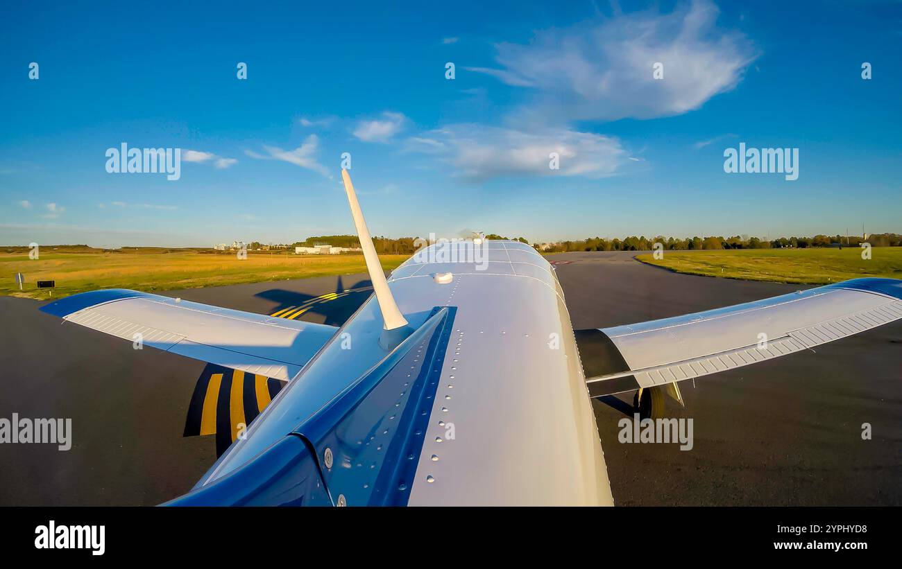 A small general aviation aircraft, its pre-takeoff checklist complete ...