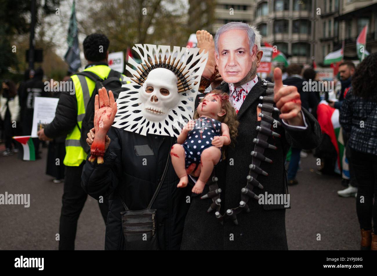London, UK. 30th Nov, 2024. A demonstrator is seen wearing a Benjamin ...