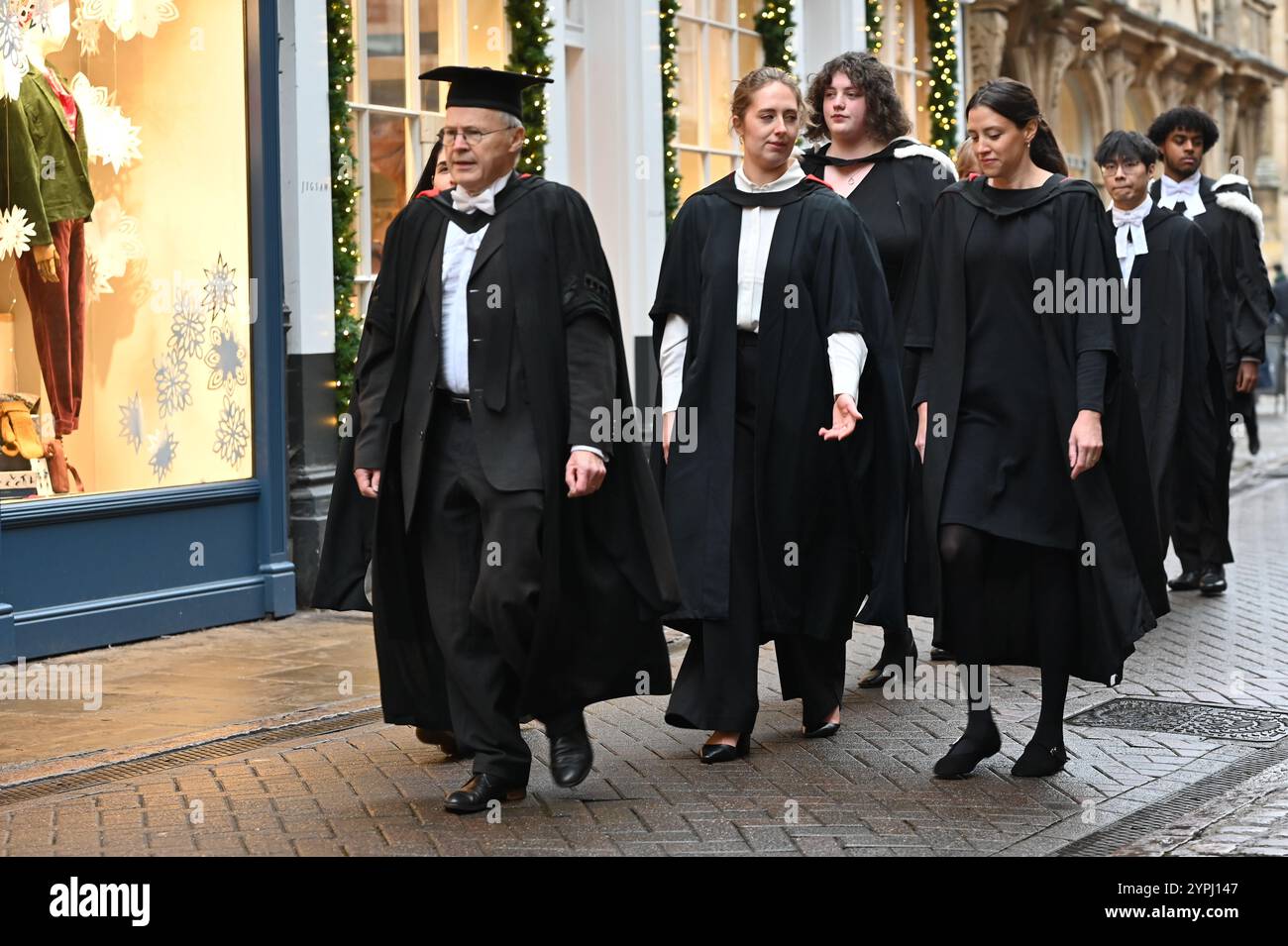Cambridge, England, 30 November 2024, UK. Students walk along Trinity ...