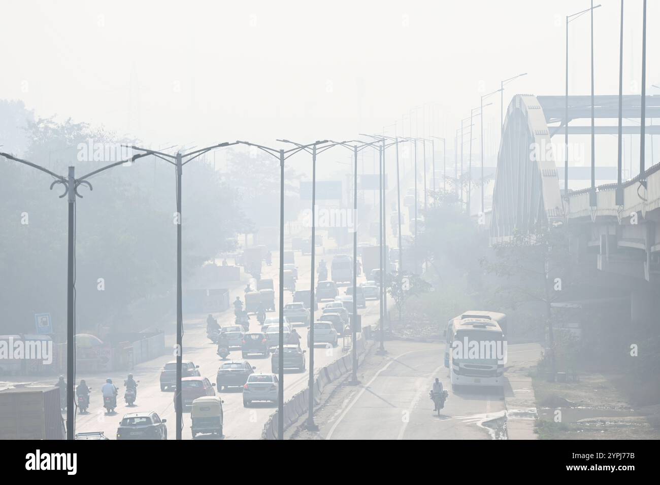 NEW DELHI, INDIA - NOVEMBER 30: Low visibility due to bad air quality during morning hours, at ...