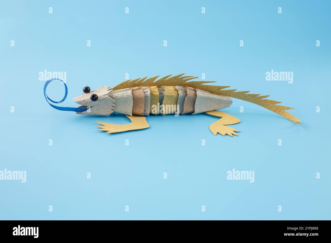 carton egg box lizard has the legs and tail are cut out from yellow ...