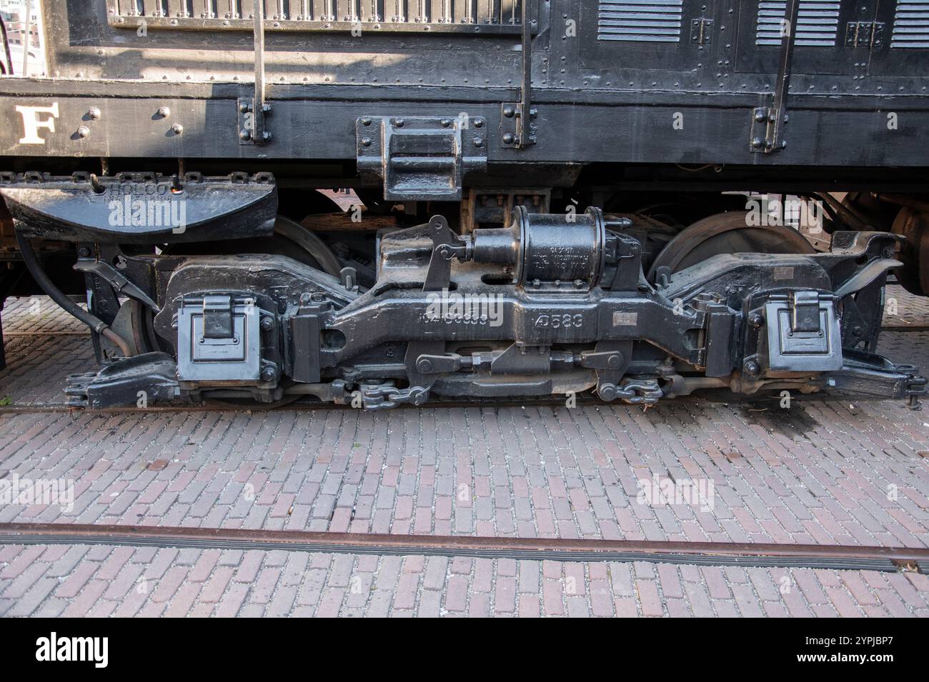 Under carriage of a locomotive at Roundhouse Park on Bremner Boulevard ...