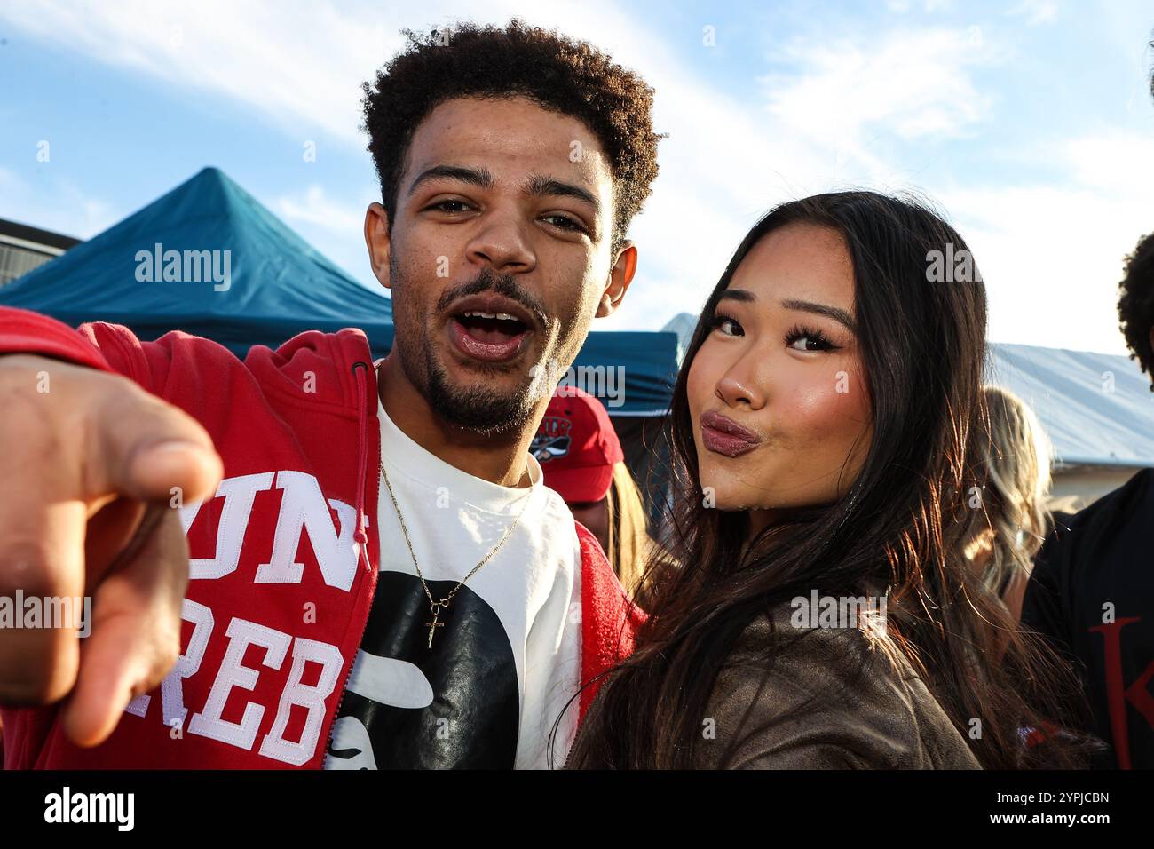 November 30, 2024: Two UNLV Rebels fans pose for a photo prior to the ...