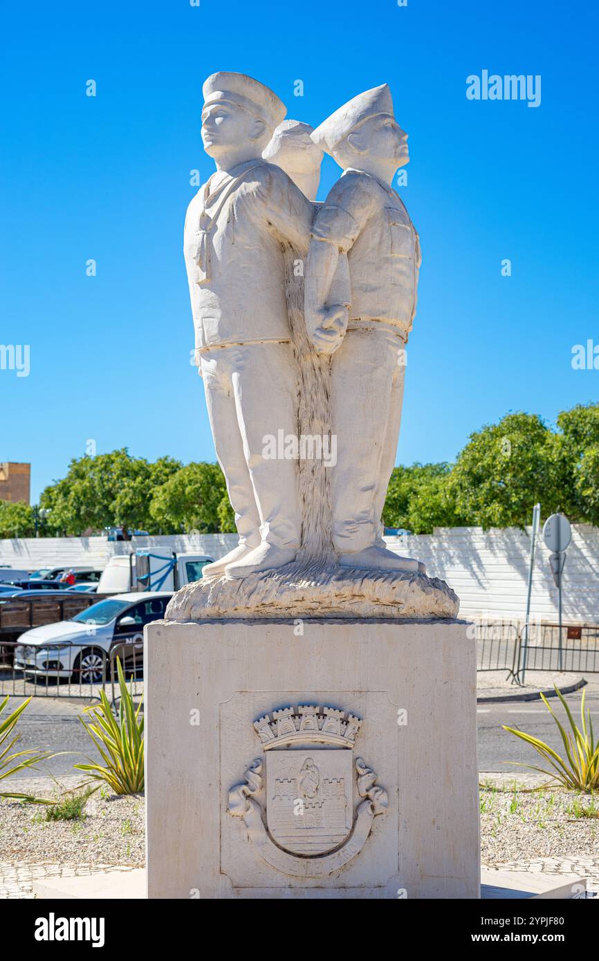 Highway roundabout with statue in honor of the army soldiers who fought ...