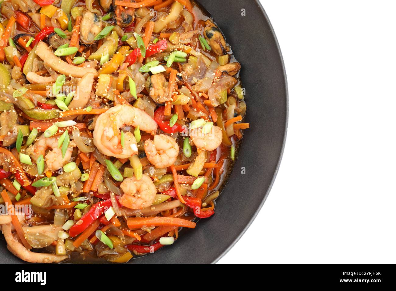 Stir-fry sea food in wok isolated on white, top view Stock Photo - Alamy